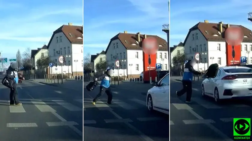 Kierowca nie przepuścił pieszego na pasach, ten uderzył w auto torbą - TVN24